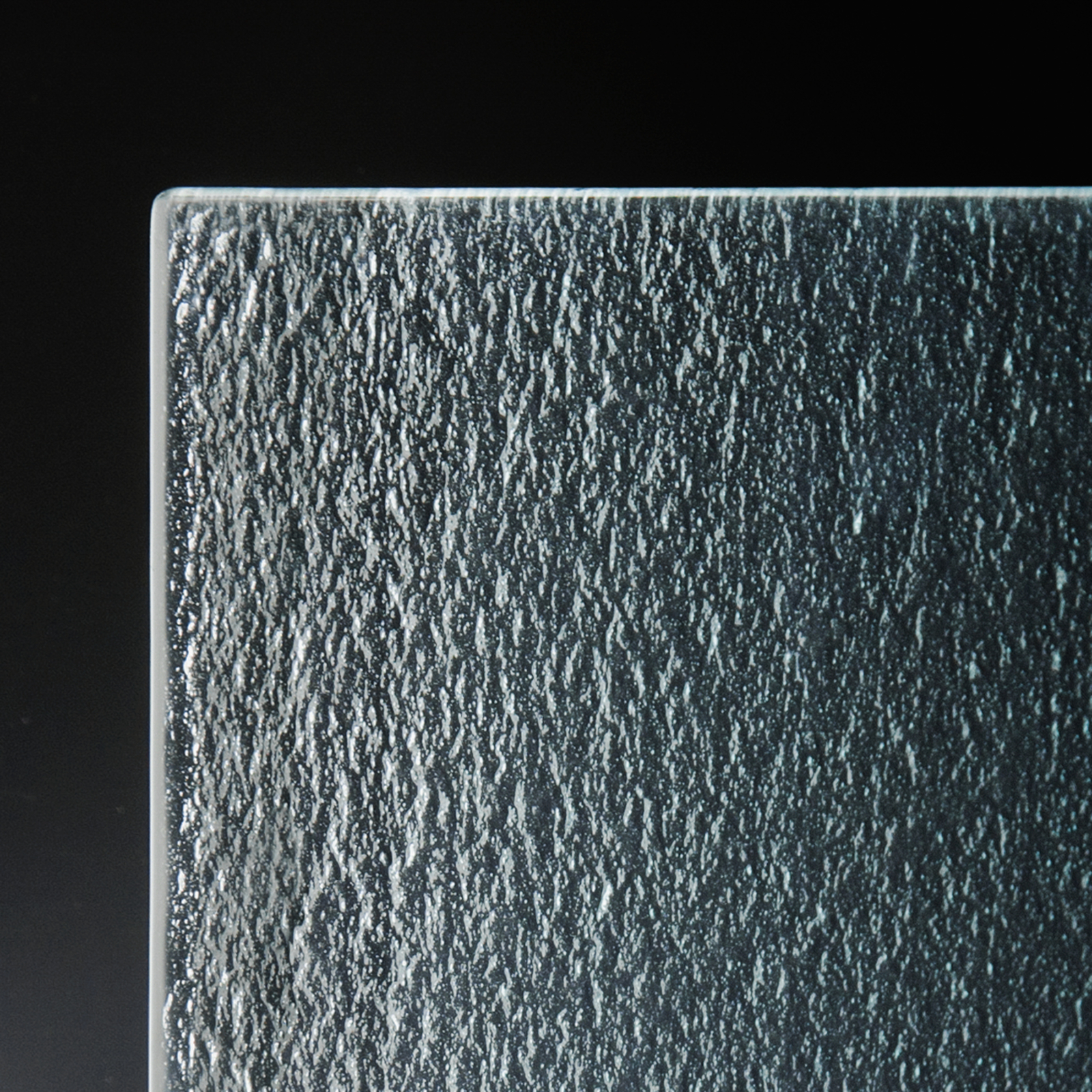 Sandstone textured glass flooring system is a hand crafted organic glass